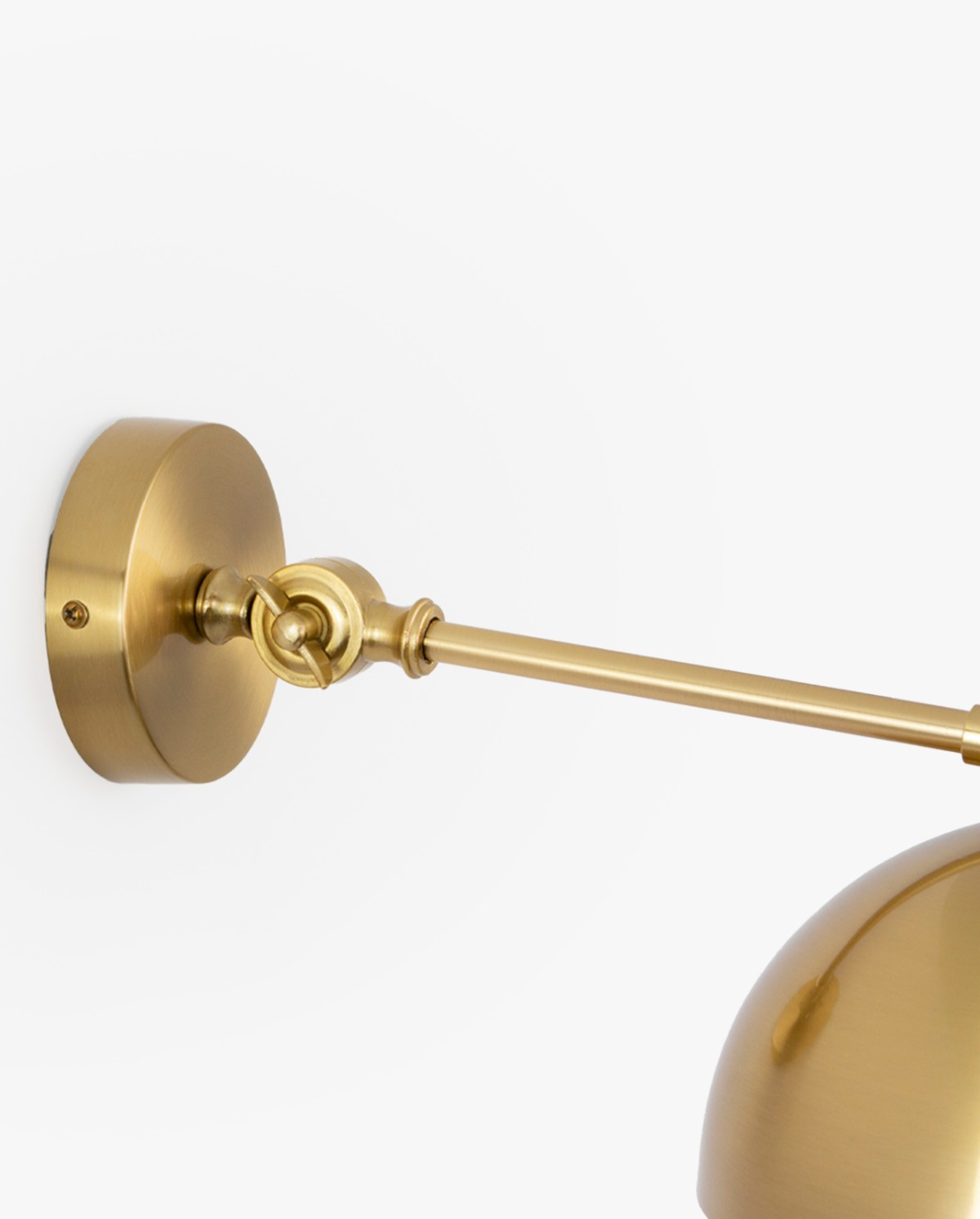 Kaia wall light in brushed gold finish metal