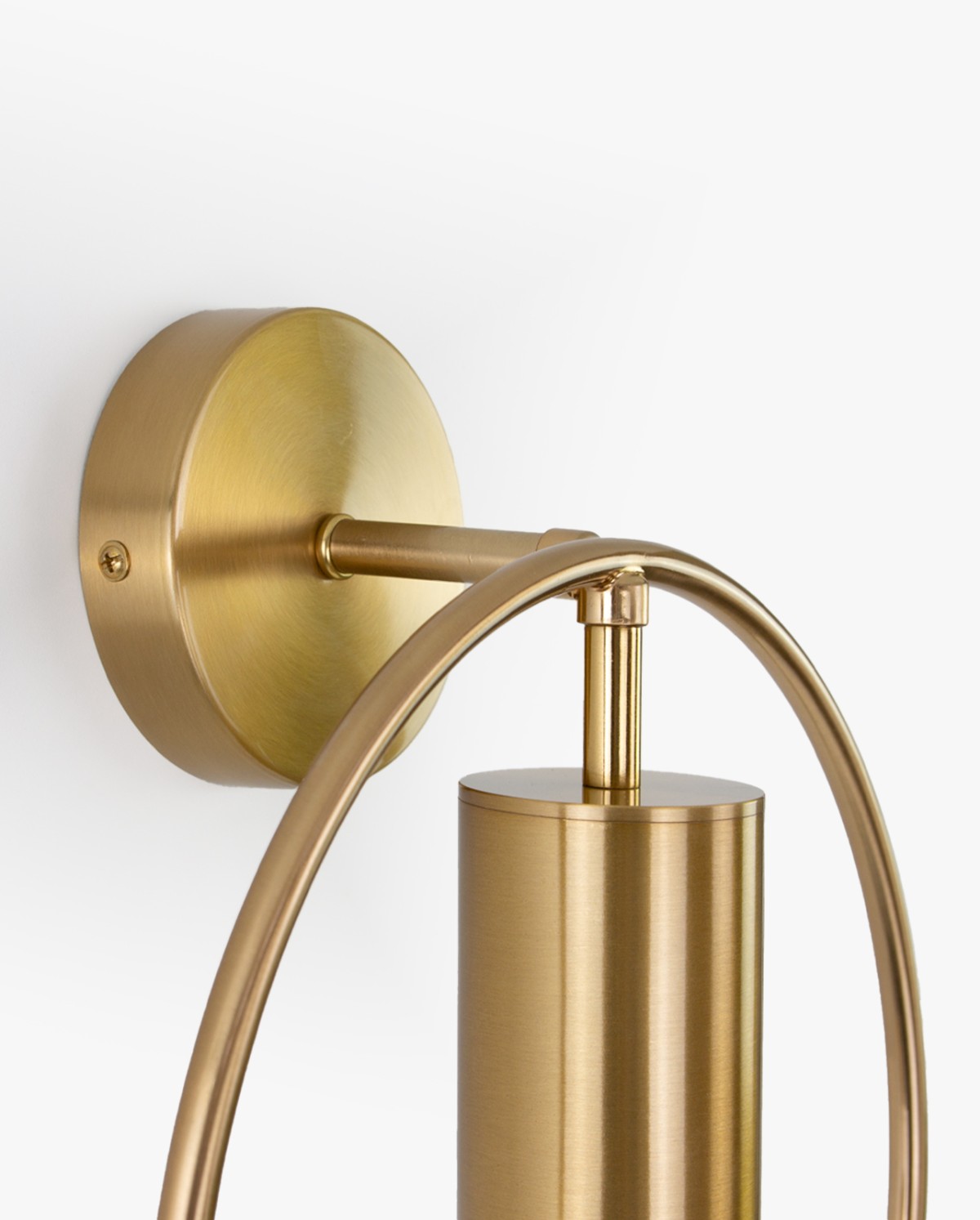 Thea wall light in brushed gold finish metal